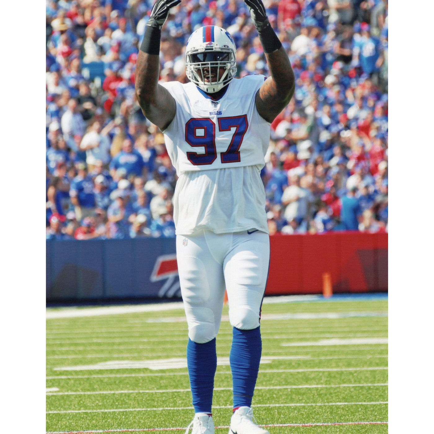 Jordan Phillips Arms Up In White Unsigned Photo — TSE Buffalo